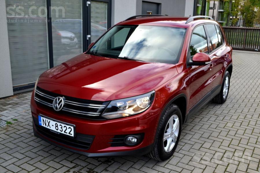 Red Volkswagen Tiguan 2012 in Riga, with an engine capacity of 1.40 L and mileage of 255 thousand km for 6990 €, photo 1 on AUTOMOTO.COM.LV
