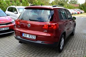 Red Volkswagen Tiguan 2012 in Riga, with an engine capacity of 1.40 L and mileage of 255 thousand km for 6990 €, photo 4 on AUTOMOTO.COM.LV