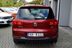 Red Volkswagen Tiguan 2012 in Riga, with an engine capacity of 1.40 L and mileage of 255 thousand km for 6990 €, photo 6 on AUTOMOTO.COM.LV