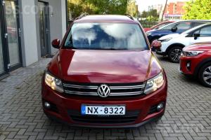 Red Volkswagen Tiguan 2012 in Riga, with an engine capacity of 1.40 L and mileage of 255 thousand km for 6990 €, photo 7 on AUTOMOTO.COM.LV