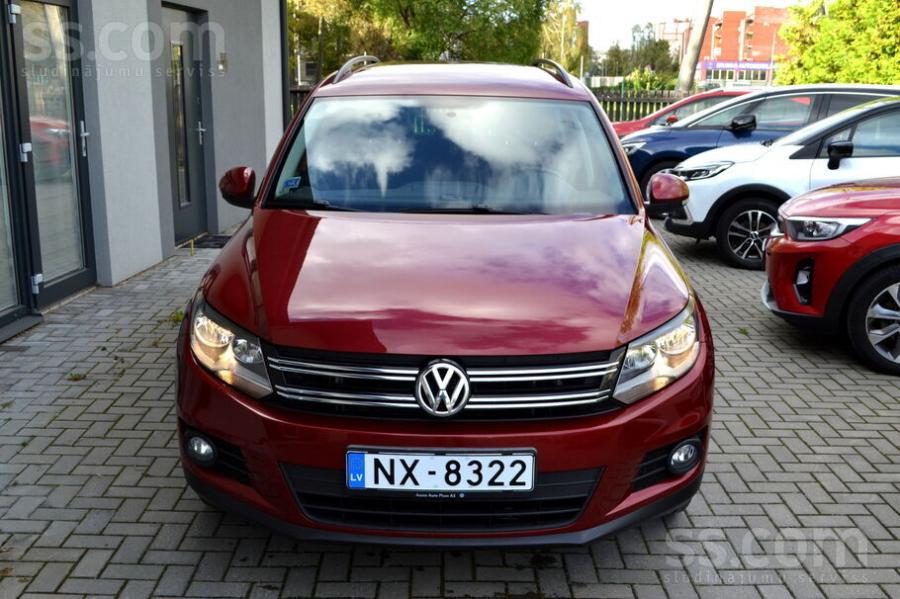 Red Volkswagen Tiguan 2012 in Riga, with an engine capacity of 1.40 L and mileage of 255 thousand km for 6990 €, photo 7 on AUTOMOTO.COM.LV