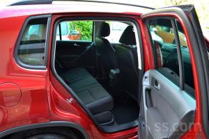 Red Volkswagen Tiguan 2012 in Riga, with an engine capacity of 1.40 L and mileage of 255 thousand km for 6990 €, photo 11 on AUTOMOTO.COM.LV