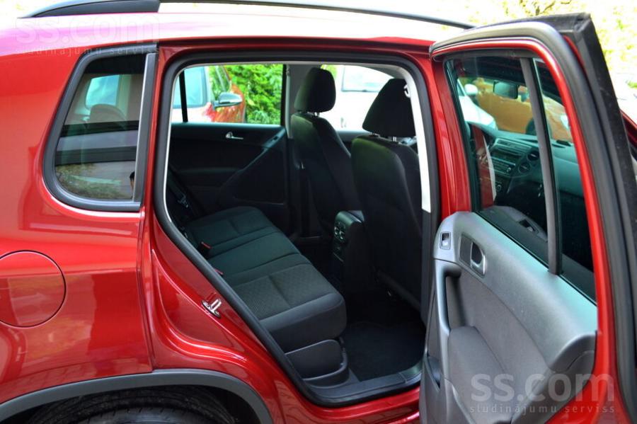 Red Volkswagen Tiguan 2012 in Riga, with an engine capacity of 1.40 L and mileage of 255 thousand km for 6990 €, photo 11 on AUTOMOTO.COM.LV