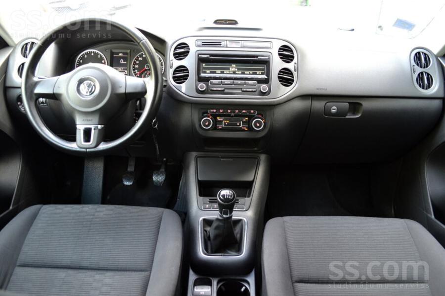 Red Volkswagen Tiguan 2012 in Riga, with an engine capacity of 1.40 L and mileage of 255 thousand km for 6990 €, photo 14 on AUTOMOTO.COM.LV