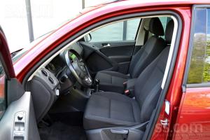 Red Volkswagen Tiguan 2012 in Riga, with an engine capacity of 1.40 L and mileage of 255 thousand km for 6990 €, photo 16 on AUTOMOTO.COM.LV