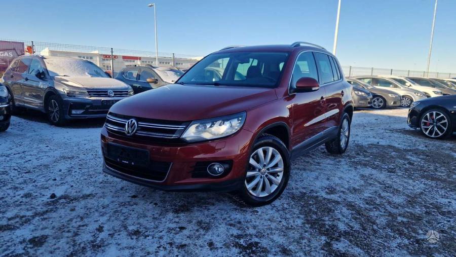 Sarkans Volkswagen Tiguan 2013 Marijampole, ar dzinēja tilpumu 1.97 L un nobraukumu 297 tūkst. km par 8290 €, foto 2 vietnē AUTOMOTO.COM.LV