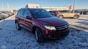 Red Volkswagen Tiguan 2013 in Marijampole, with an engine capacity of 2.00 L and mileage of 297 thousand km for 8290 €, photo 5 on AUTOMOTO.COM.LV