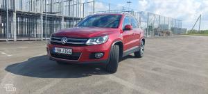 Sarkans Volkswagen Tiguan 2013 Panevēža, ar dzinēja tilpumu 2.00 L un nobraukumu 263 tūkst. km par 8500 €, foto  vietnē AUTOMOTO.COM.LV