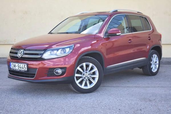 Red Volkswagen Tiguan 2013 in Talsi, with an engine capacity of 2.00 L and mileage of 224 thousand km for 9900 €, photo 4 on AUTOMOTO.COM.LV