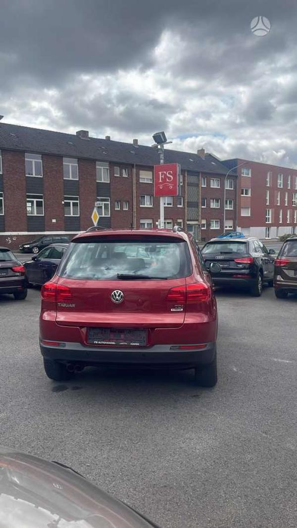 Sarkans Volkswagen Tiguan 2014 Jurbarkas, ar dzinēja tilpumu 1.97 L un nobraukumu 187 tūkst. km par 8499 €, foto 5 vietnē AUTOMOTO.COM.LV
