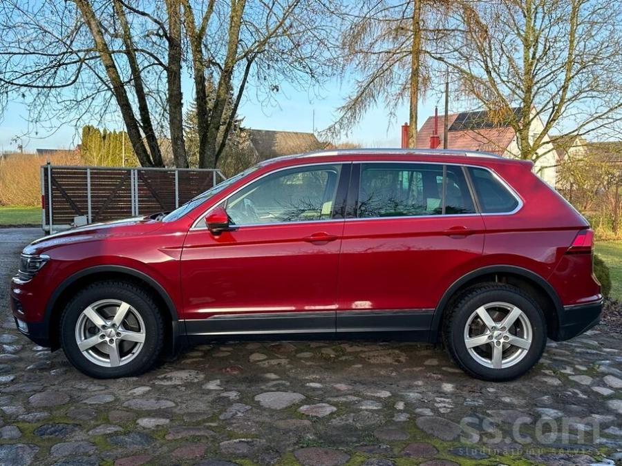 Red Volkswagen Tiguan 2016 in Saldus, with an engine capacity of 2.00 L and mileage of 237 thousand km for 15990 €, photo 6 on AUTOMOTO.COM.LV