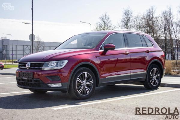 Red Volkswagen Tiguan 2016 in Kaunas, with an engine capacity of 2.00 L and mileage of 162 thousand km for 14900 €, photo 1 on AUTOMOTO.COM.LV