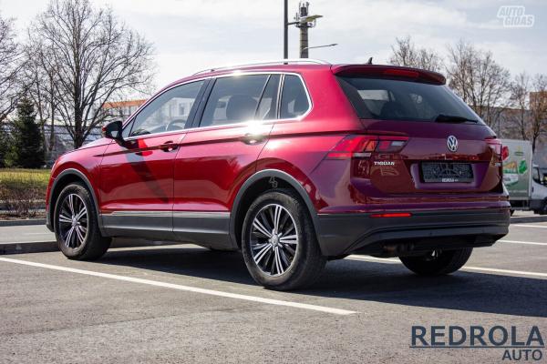 Red Volkswagen Tiguan 2016 in Kaunas, with an engine capacity of 2.00 L and mileage of 162 thousand km for 14900 €, photo 6 on AUTOMOTO.COM.LV