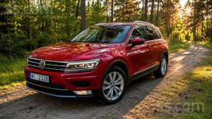 Red Volkswagen Tiguan 2016 in Riga, with an engine capacity of 2.00 L and mileage of 158 thousand km for 15200 €, photo  on AUTOMOTO.COM.LV