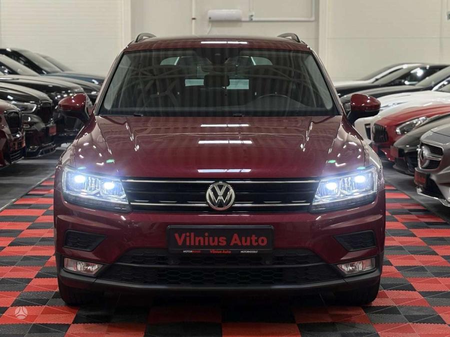 Red Volkswagen Tiguan 2016 in Vilnius, with an engine capacity of 1.40 L and mileage of 146 thousand km for 16490 €, photo 3 on AUTOMOTO.COM.LV