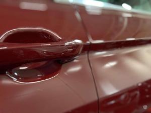 Red Volkswagen Tiguan 2016 in Vilnius, with an engine capacity of 1.40 L and mileage of 146 thousand km for 16490 €, photo 11 on AUTOMOTO.COM.LV