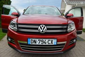 Red Volkswagen Tiguan 2016 in Kaunas, with an engine capacity of 2.00 L and mileage of 249 thousand km for 8950 €, photo 4 on AUTOMOTO.COM.LV