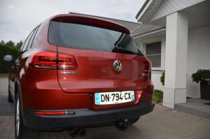 Red Volkswagen Tiguan 2016 in Kaunas, with an engine capacity of 2.00 L and mileage of 249 thousand km for 8950 €, photo 6 on AUTOMOTO.COM.LV