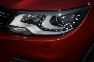 Red Volkswagen Tiguan 2016 in Kaunas, with an engine capacity of 2.00 L and mileage of 249 thousand km for 8950 €, photo 7 on AUTOMOTO.COM.LV