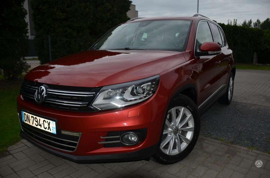 Red Volkswagen Tiguan 2016 in Kaunas, with an engine capacity of 2.00 L and mileage of 249 thousand km for 8950 €, photo 11 on AUTOMOTO.COM.LV