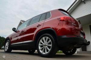 Red Volkswagen Tiguan 2016 in Kaunas, with an engine capacity of 2.00 L and mileage of 249 thousand km for 8950 €, photo 17 on AUTOMOTO.COM.LV
