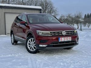 Red Volkswagen Tiguan 2017 in Cesis, with an engine capacity of 2.00 L and mileage of 210 thousand km for 15900 €, photo  on AUTOMOTO.COM.LV