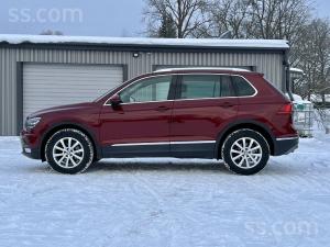Red Volkswagen Tiguan 2017 in Cesis, with an engine capacity of 2.00 L and mileage of 210 thousand km for 15900 €, photo 5 on AUTOMOTO.COM.LV