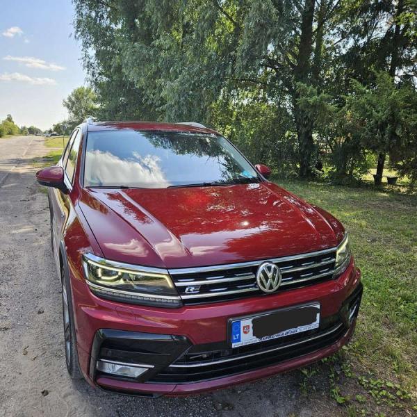 Red Volkswagen Tiguan 2017 in Marijampole, with an engine capacity of 1.97 L and mileage of 253 thousand km for 18500 €, photo 2 on AUTOMOTO.COM.LV