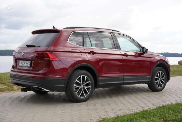 Red Volkswagen Tiguan 2019 in Kaunas, with an engine capacity of 1.98 L and mileage of 107 thousand km for 17900 €, photo 1 on AUTOMOTO.COM.LV