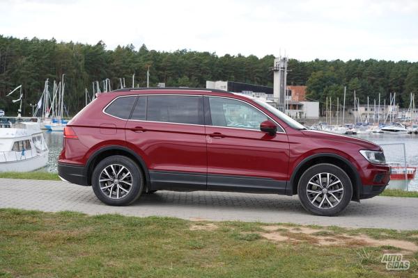 Red Volkswagen Tiguan 2019 in Kaunas, with an engine capacity of 2.00 L and mileage of 115 thousand km for 17500 €, photo 1 on AUTOMOTO.COM.LV