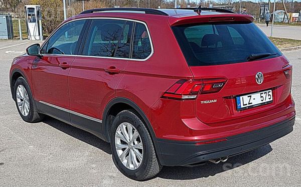 Red Volkswagen Tiguan 2019 in Riga, with an engine capacity of 2.00 L and mileage of 142 thousand km for 16800 €, photo 4 on AUTOMOTO.COM.LV