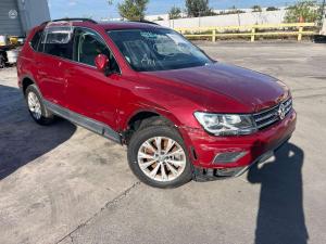 Red Volkswagen Tiguan 2019 in Vilnius, with an engine capacity of 1.98 L and mileage of 67 thousand km for 7300 €, photo  on AUTOMOTO.COM.LV