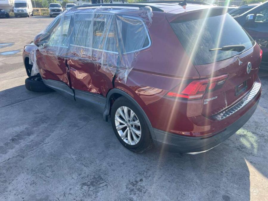 Red Volkswagen Tiguan 2019 in Vilnius, with an engine capacity of 1.98 L and mileage of 67 thousand km for 7300 €, photo 8 on AUTOMOTO.COM.LV