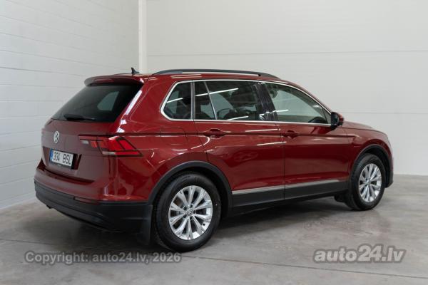 Red Volkswagen Tiguan 2016 in Tallinn, with an engine capacity of 1.40 L and mileage of 238 thousand km for 12790 €, photo 9 on AUTOMOTO.COM.LV