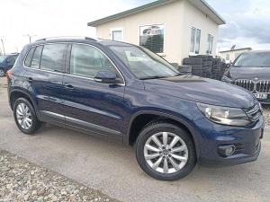 Violet Volkswagen Tiguan 2013 in Vilnius, with an engine capacity of 1.97 L and mileage of 199 thousand km for 9300 €, photo  on AUTOMOTO.COM.LV