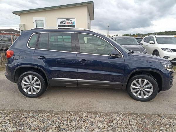 Violet Volkswagen Tiguan 2013 in Vilnius, with an engine capacity of 1.97 L and mileage of 199 thousand km for 9300 €, photo 3 on AUTOMOTO.COM.LV