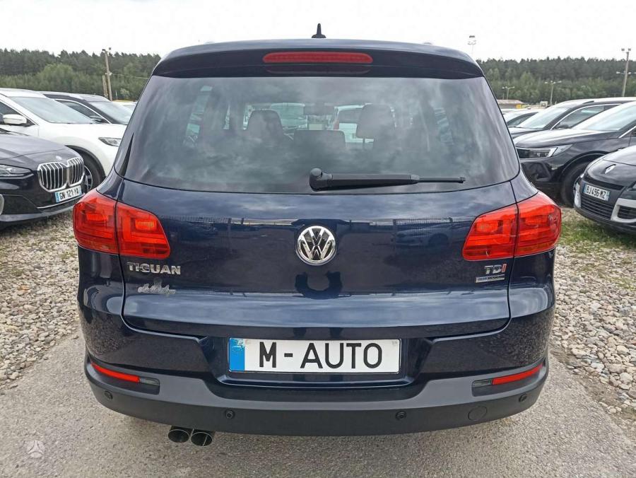 Violet Volkswagen Tiguan 2013 in Vilnius, with an engine capacity of 1.97 L and mileage of 199 thousand km for 9300 €, photo 5 on AUTOMOTO.COM.LV