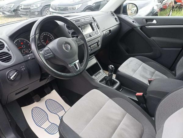 Violet Volkswagen Tiguan 2013 in Vilnius, with an engine capacity of 1.97 L and mileage of 199 thousand km for 9300 €, photo 8 on AUTOMOTO.COM.LV