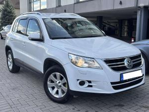 White Volkswagen Tiguan 2009 in Kaunas, with an engine capacity of 1.97 L and mileage of 300 thousand km for 3200 €, photo 7 on AUTOMOTO.COM.LV