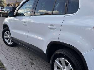 White Volkswagen Tiguan 2009 in Kaunas, with an engine capacity of 1.97 L and mileage of 300 thousand km for 3200 €, photo 11 on AUTOMOTO.COM.LV
