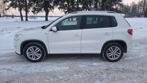 Balts Volkswagen Tiguan 2011 Kauņa, ar dzinēja tilpumu 1.39 L un nobraukumu 236 tūkst. km par 5200 €, foto 10 vietnē AUTOMOTO.COM.LV