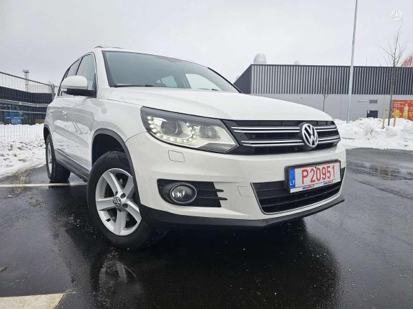 White Volkswagen Tiguan 2011 in Kaunas, with an engine capacity of 1.39 L and mileage of 218 thousand km for 7899 €, photo 5 on AUTOMOTO.COM.LV
