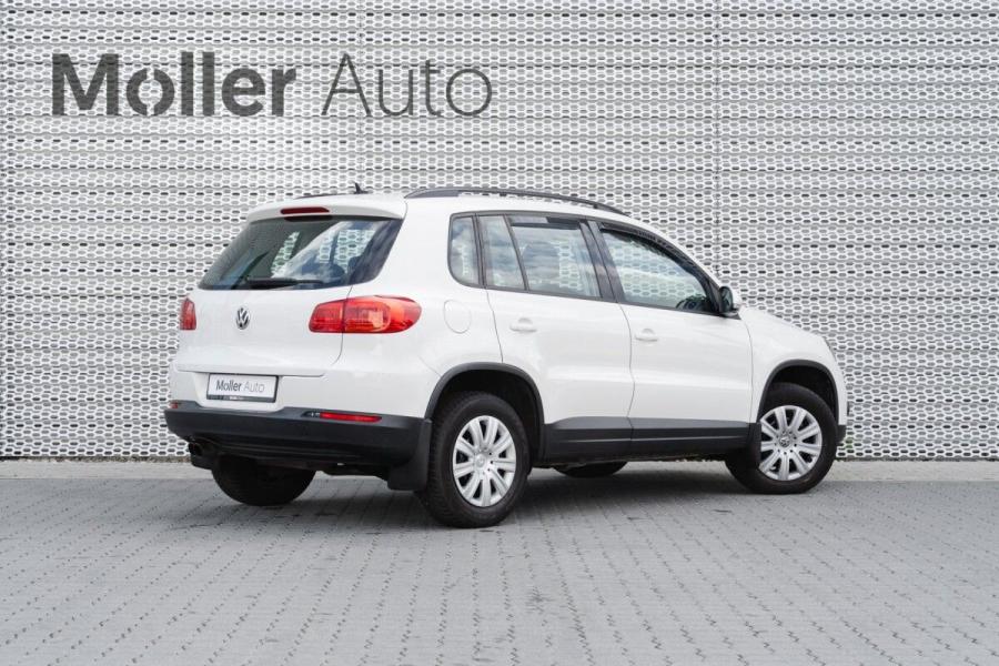 White Volkswagen Tiguan 2011 in Marupe, with an engine capacity of 2.00 L and mileage of 157 thousand km for 5900 €, photo 5 on AUTOMOTO.COM.LV