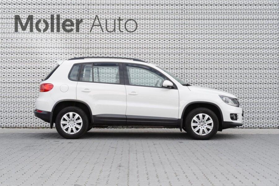 White Volkswagen Tiguan 2011 in Marupe, with an engine capacity of 2.00 L and mileage of 157 thousand km for 5900 €, photo 6 on AUTOMOTO.COM.LV
