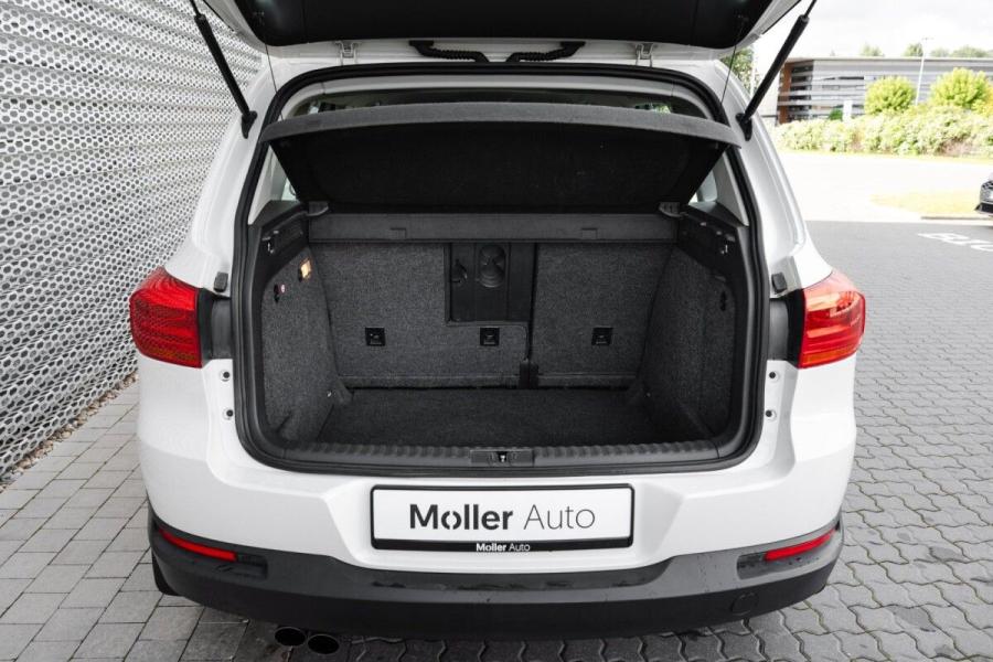 White Volkswagen Tiguan 2011 in Marupe, with an engine capacity of 2.00 L and mileage of 157 thousand km for 5900 €, photo 17 on AUTOMOTO.COM.LV