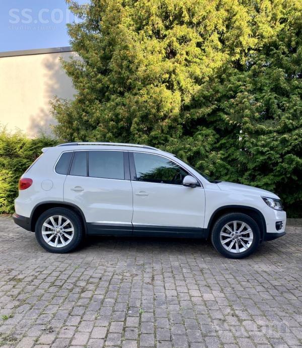 White Volkswagen Tiguan 2012 in Riga, with an engine capacity of 2.00 L and mileage of 121 thousand km for 9500 €, photo 5 on AUTOMOTO.COM.LV
