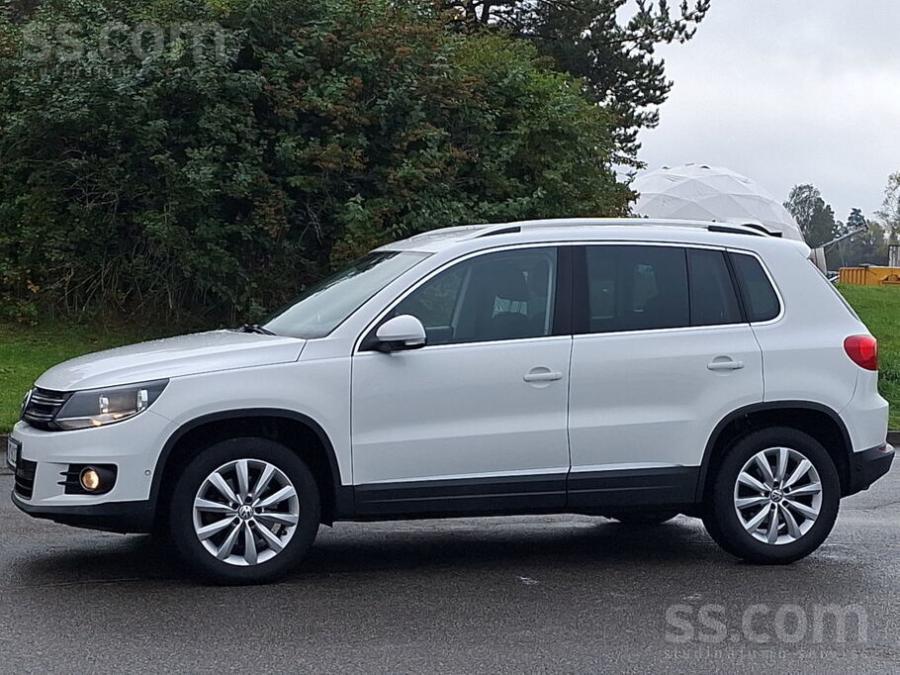 White Volkswagen Tiguan 2012 in Cesis, with an engine capacity of 2.00 L and mileage of 250 thousand km for 8950 €, photo 8 on AUTOMOTO.COM.LV