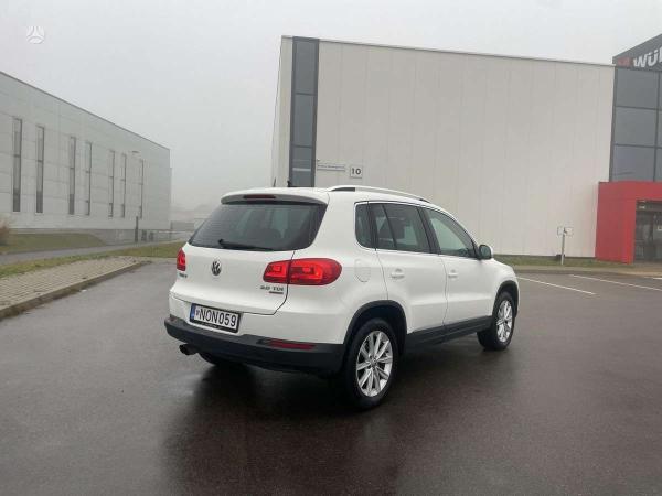 White Volkswagen Tiguan 2012 in Vilnius, with an engine capacity of 1.97 L and mileage of 209 thousand km for 10950 €, photo 5 on AUTOMOTO.COM.LV