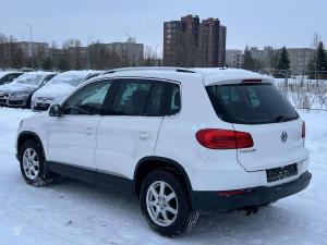 White Volkswagen Tiguan 2012 in Kedainiai, with an engine capacity of 1.40 L and mileage of 276 thousand km for 7450 €, photo 3 on AUTOMOTO.COM.LV