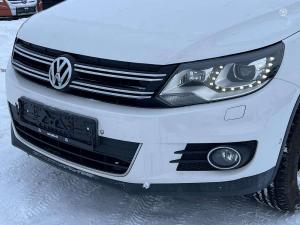 White Volkswagen Tiguan 2012 in Kedainiai, with an engine capacity of 1.40 L and mileage of 276 thousand km for 7450 €, photo 8 on AUTOMOTO.COM.LV
